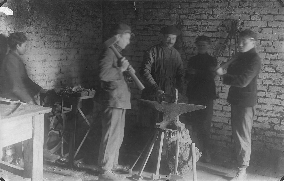 Students using hammers in a workshop, unknown location, 1920s-1930s ...
